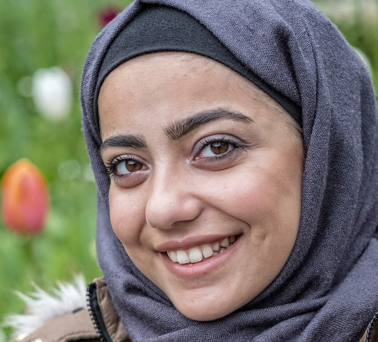 Yomna reist het land door als boegbeeld van gezinshereniging | Trouw